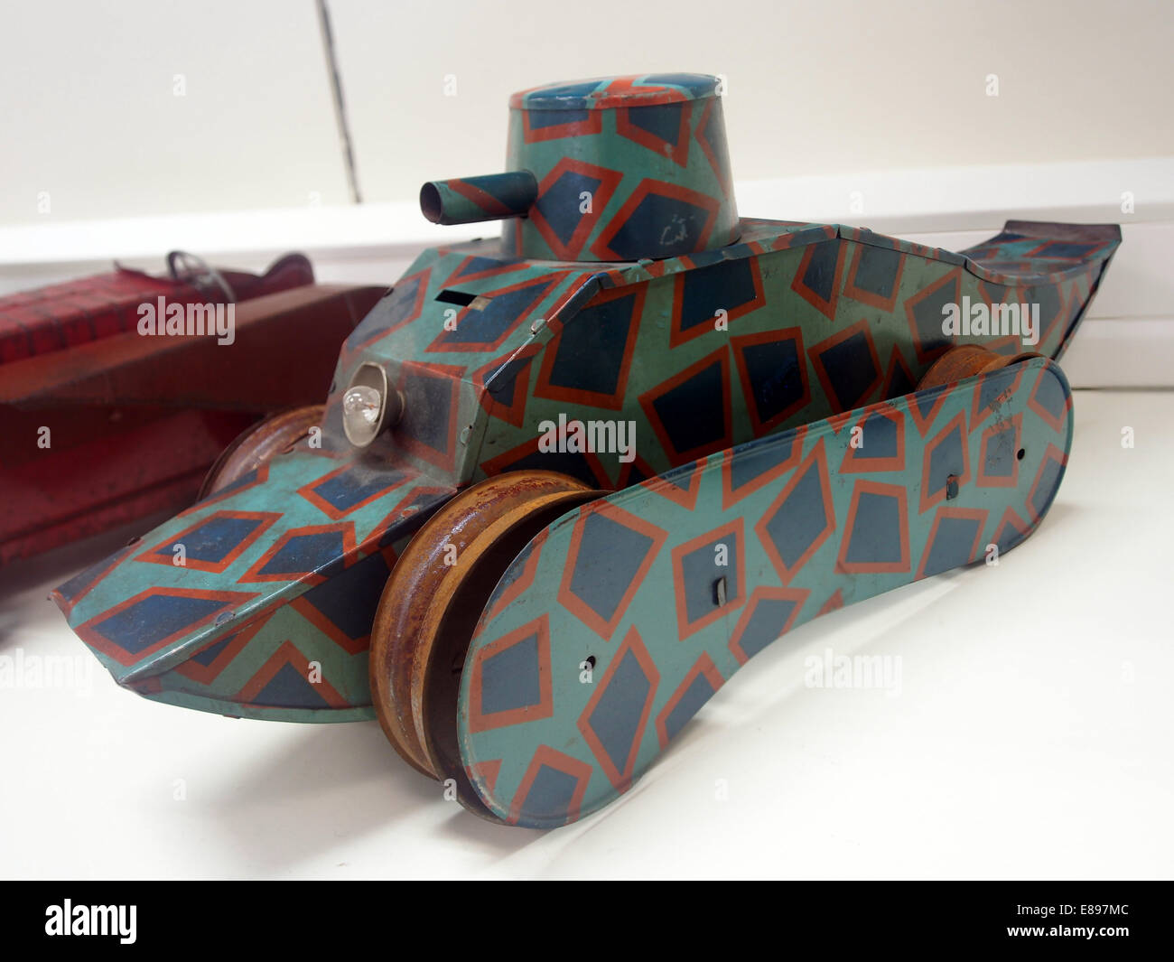A historical WWI tin toy tank, capturing a piece of early 20th-century ...