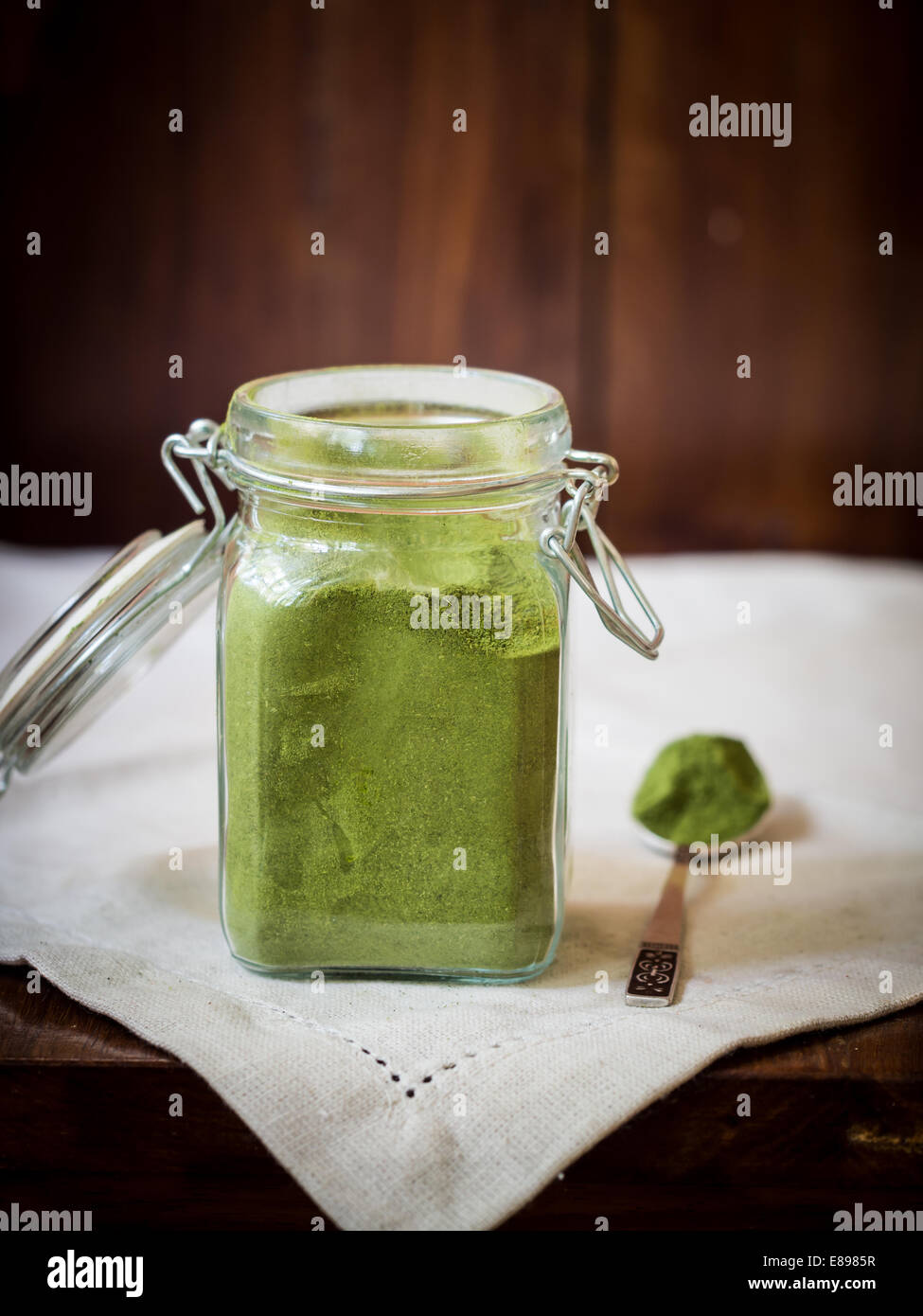 Moringa powder in a jar Stock Photo - Alamy