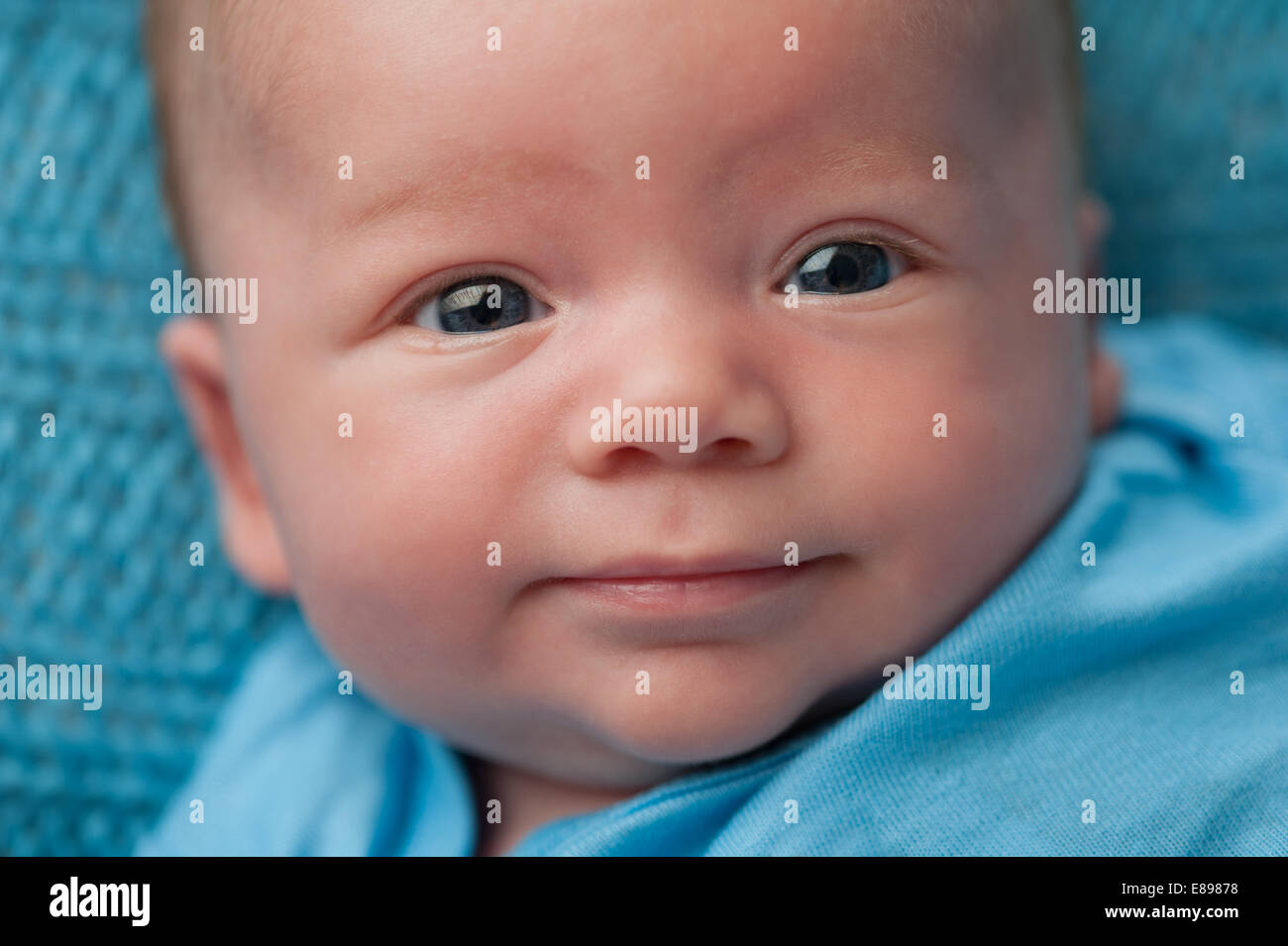 Baby wearing onesy hi-res stock photography and images - Alamy