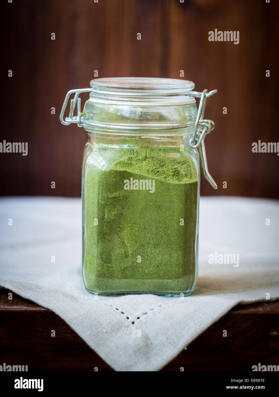 Moringa powder in a jar Stock Photo - Alamy