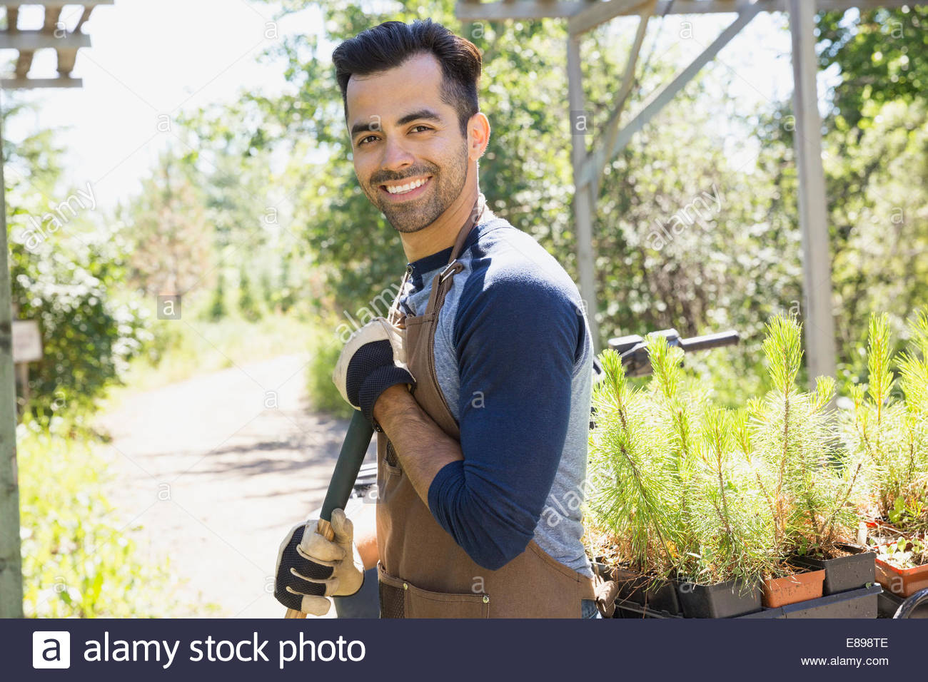 Smiling worker hi-res stock photography and images - Alamy