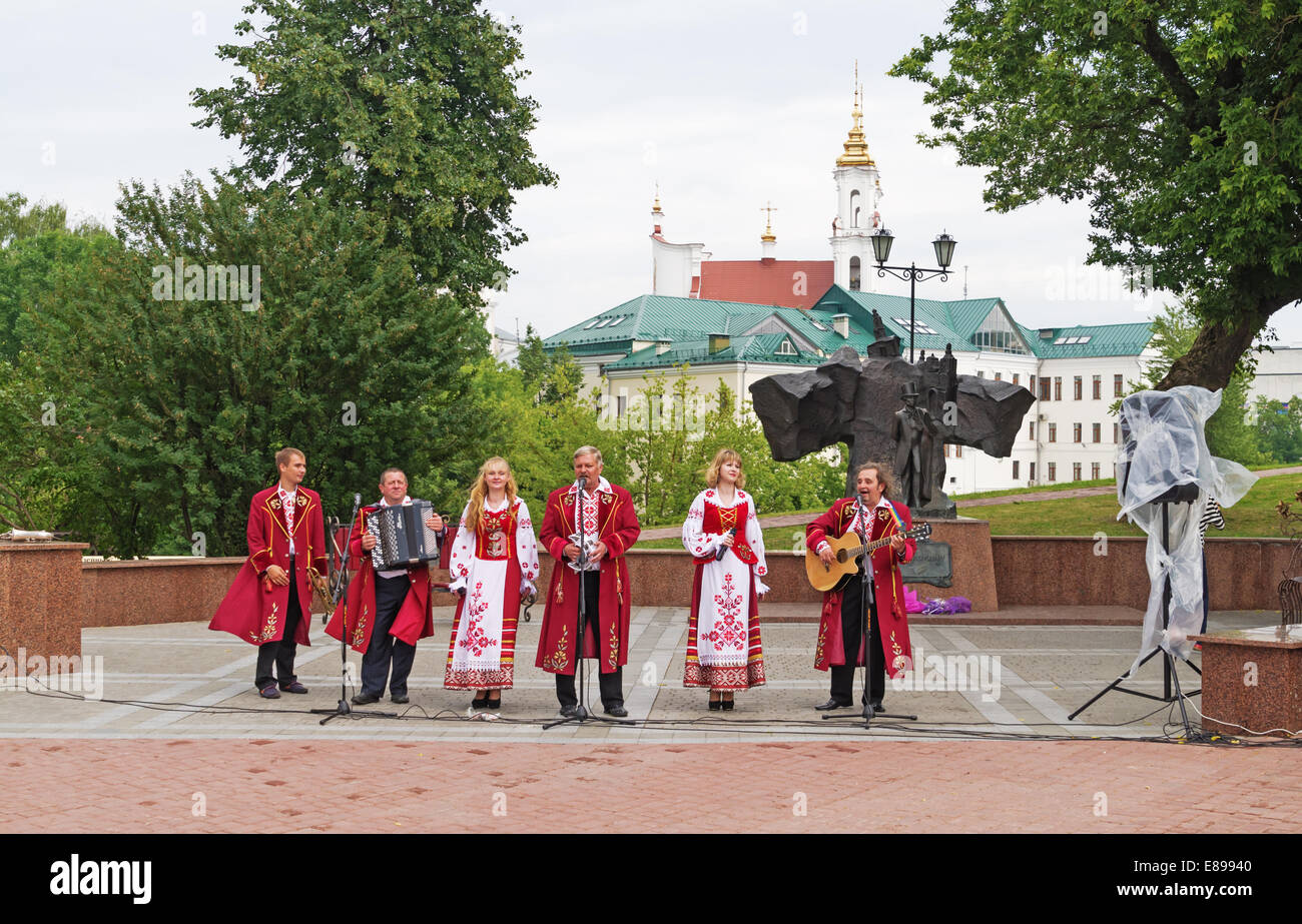 The Belarus folklore groups dance and sings on streets in Vitebsk Stock ...