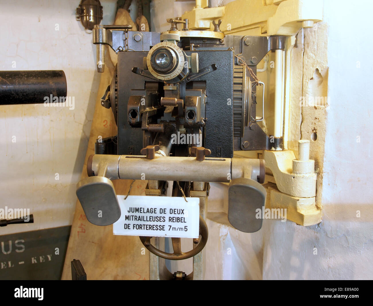 The photo shows two 7.5mm Reibel machine guns mounted in a casemate at ...