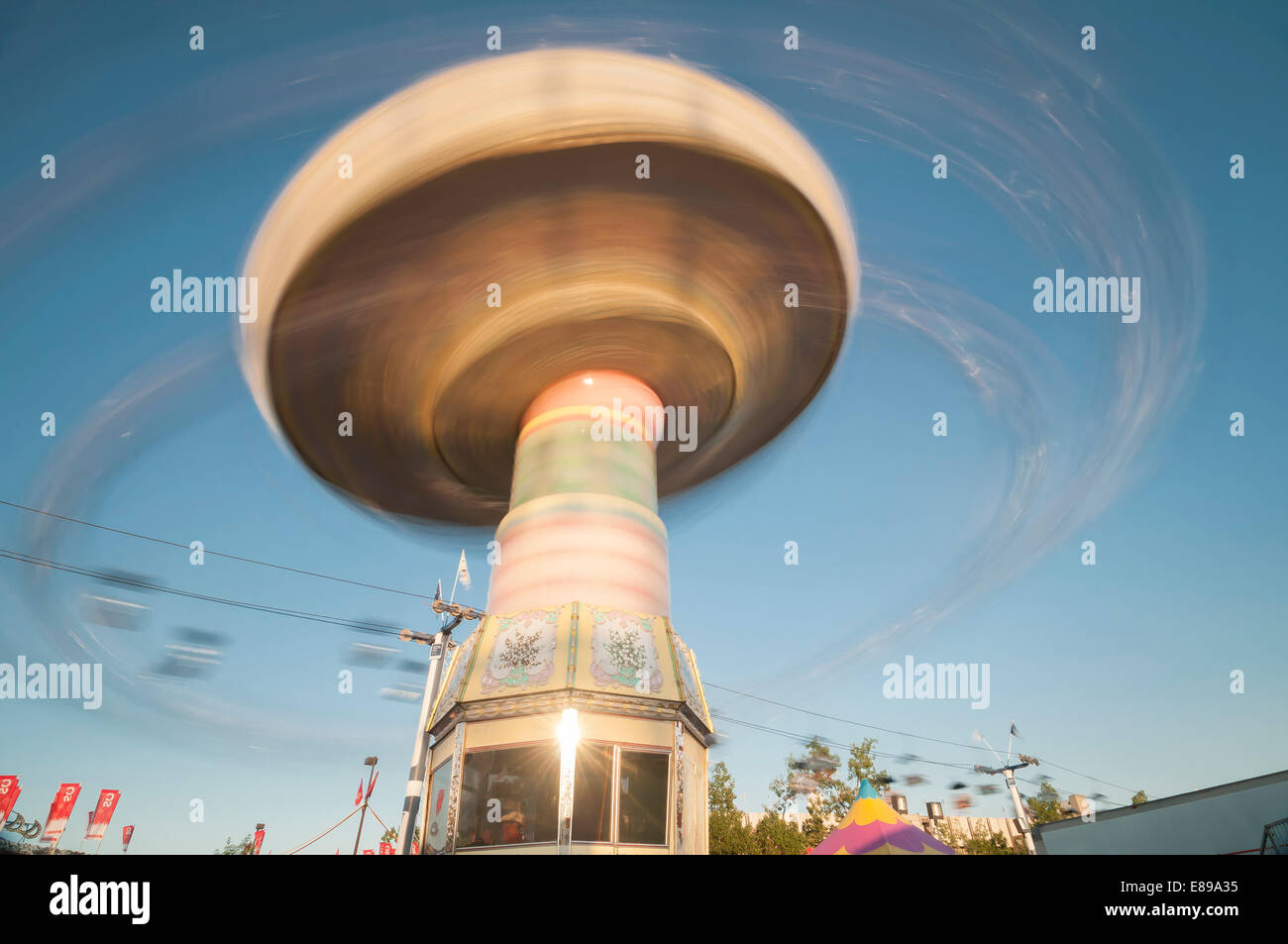 Roundabout park carousel blur speed hi-res stock photography and images ...