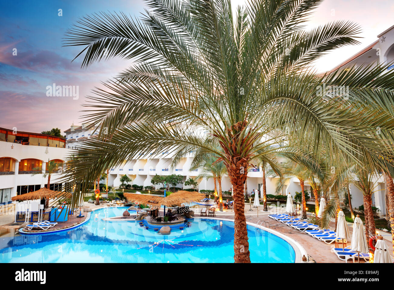 The swimming pool at luxury hotel during sunset, Sharm el Sheikh, Egypt ...