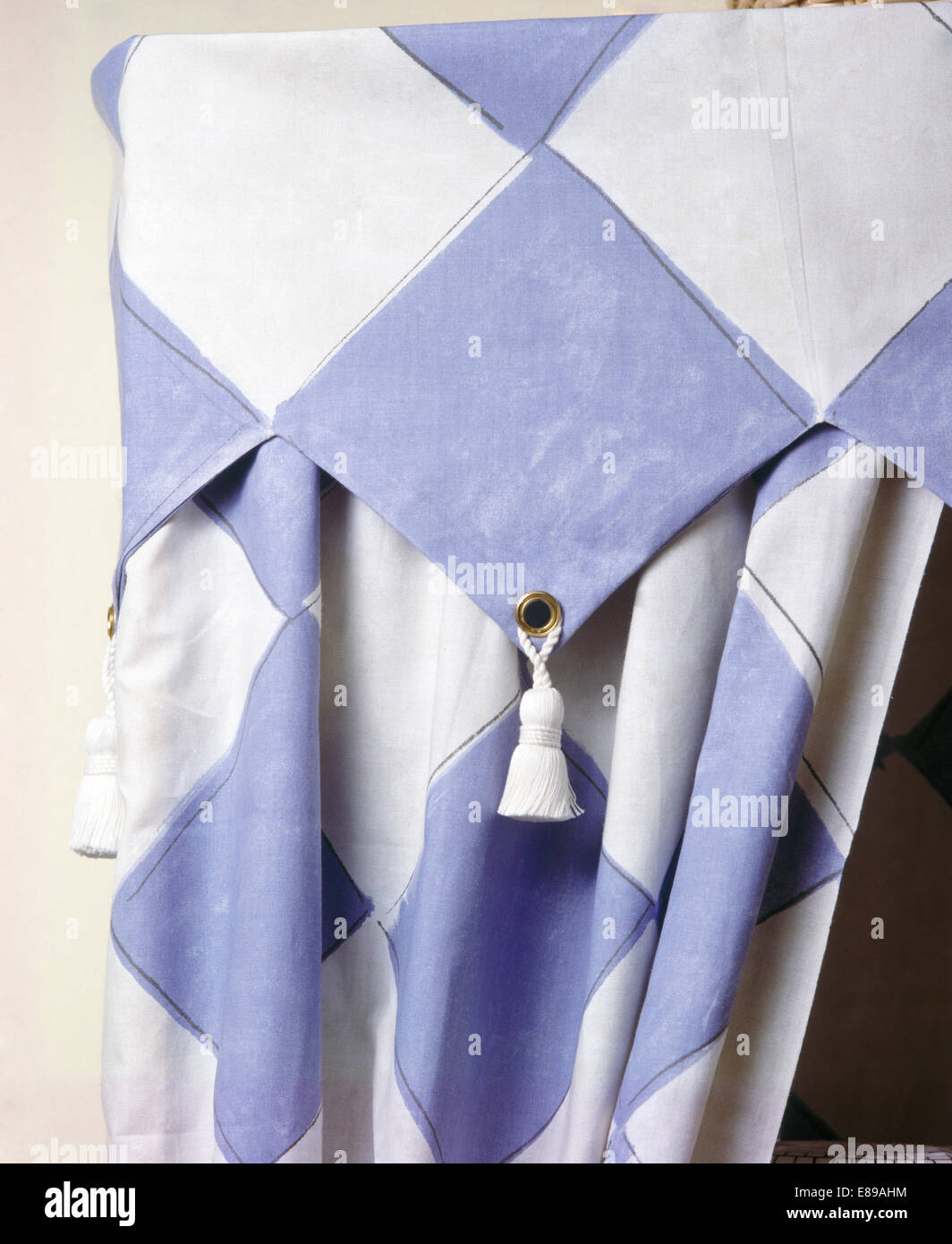 Close-up of painted blue+white chequerboard curtain and pelmet Stock ...