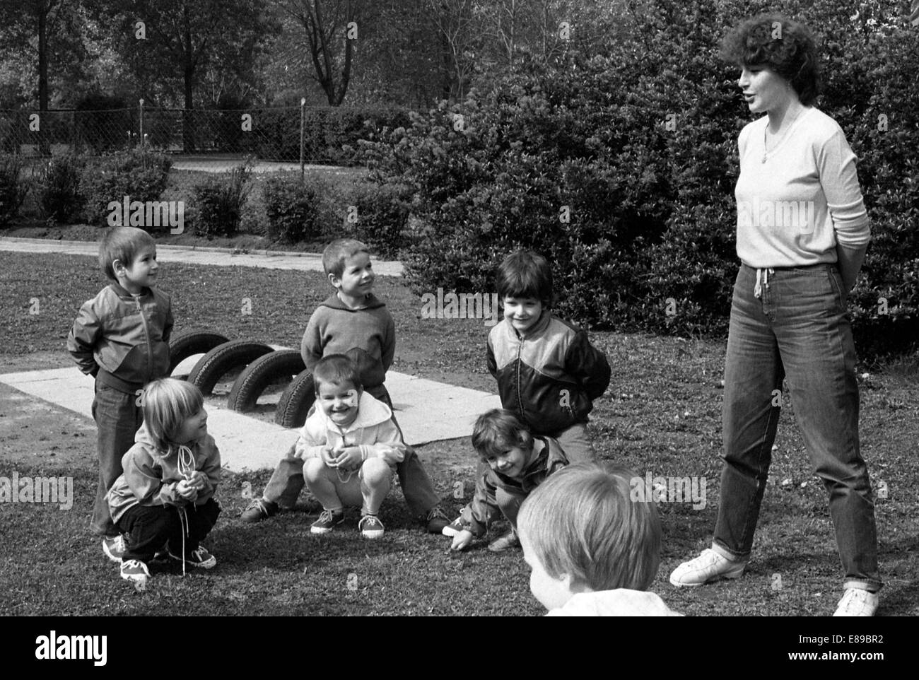 Day care teacher Black and White Stock Photos & Images - Alamy