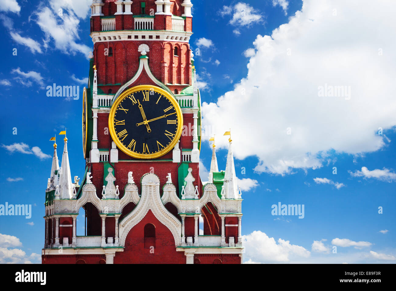 Kremlin Spasskaya tower clock over sky with clouds Stock Photo - Alamy