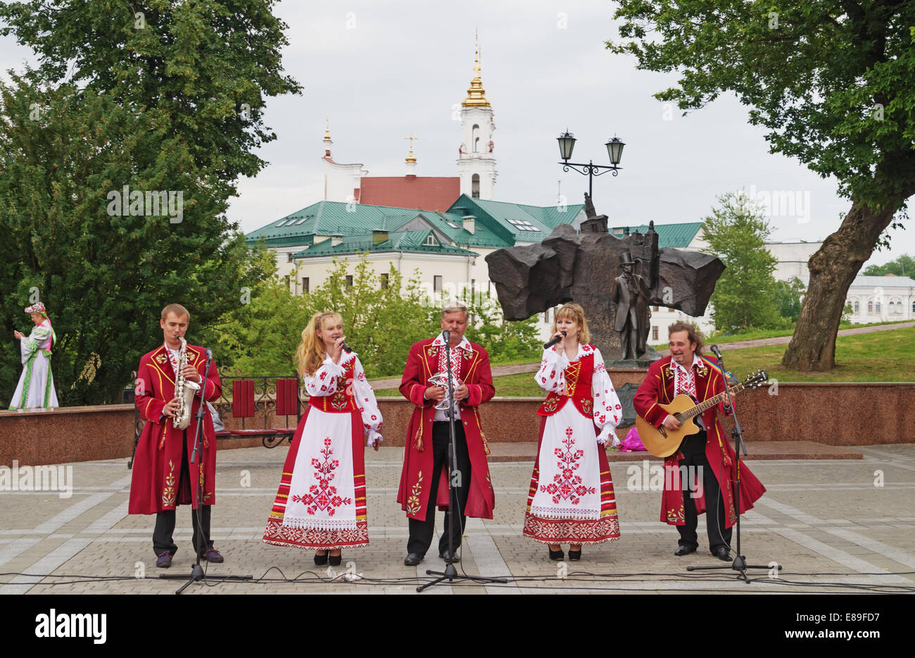 The Belarus folklore groups dance and sings on streets in Vitebsk Stock ...