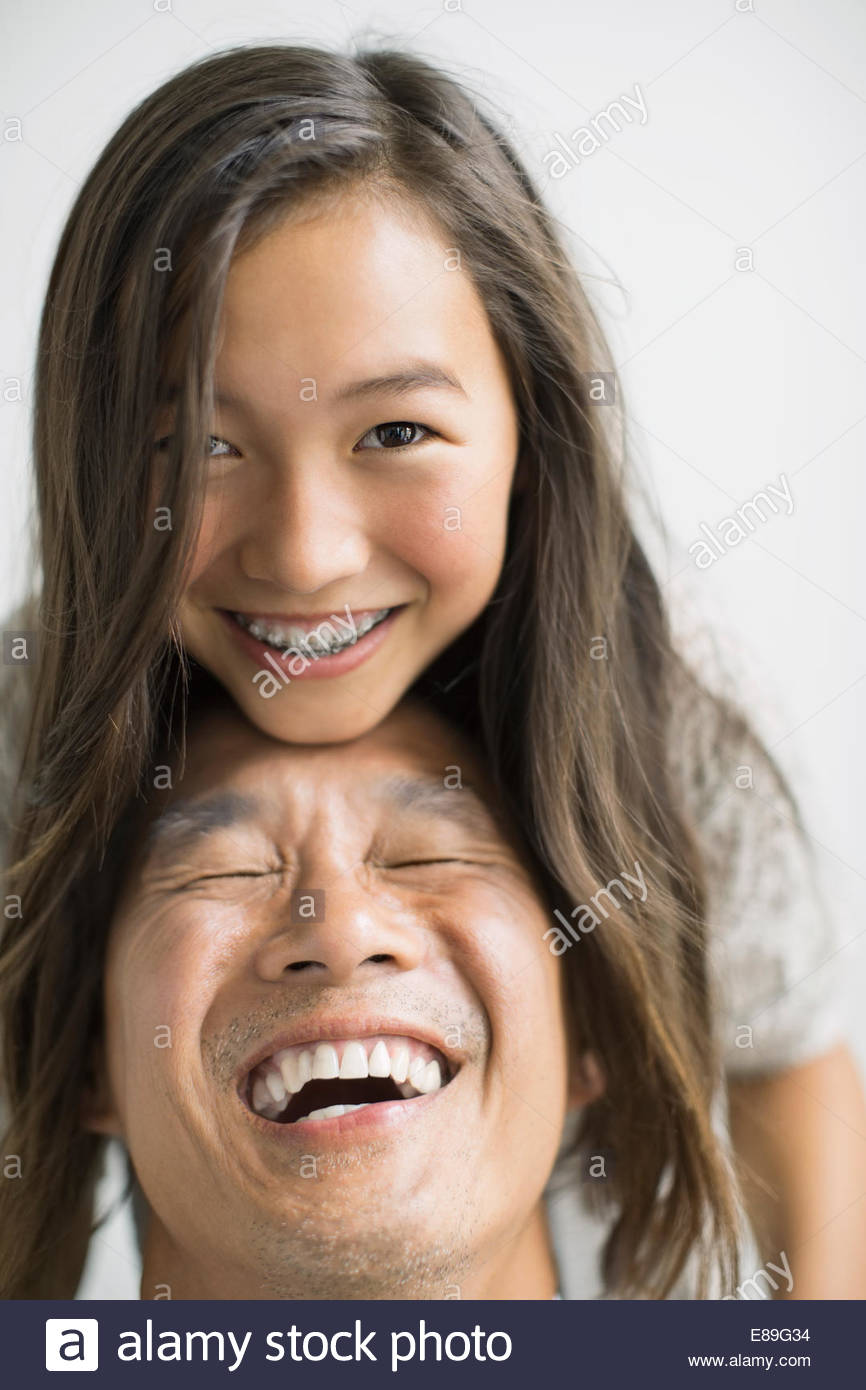 Girl laughing with her father hi-res stock photography and images - Alamy