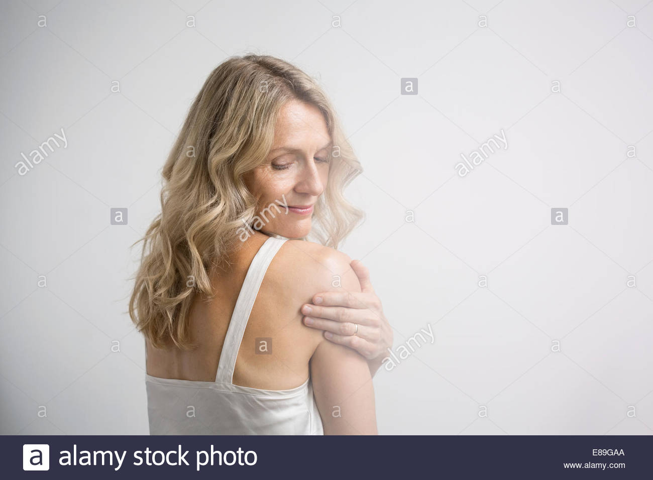 Touching shoulder hi-res stock photography and images - Alamy