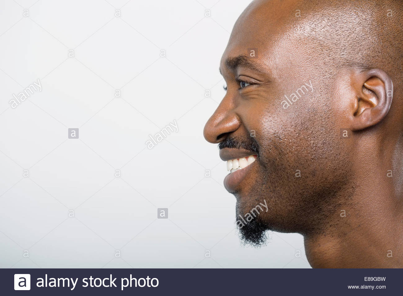 Smile smiling side profile hi-res stock photography and images - Alamy
