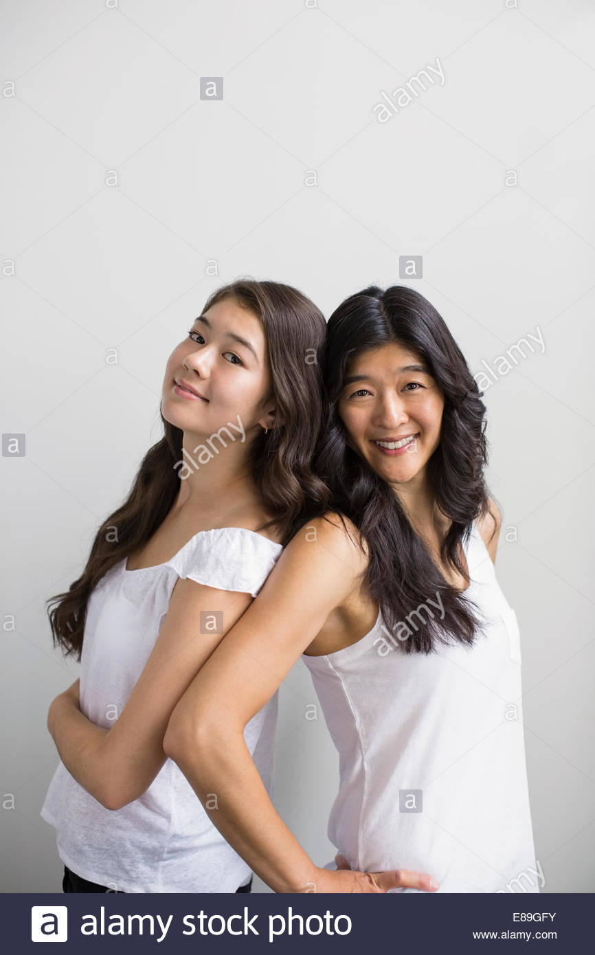 Daughter standing hi-res stock photography and images - Alamy