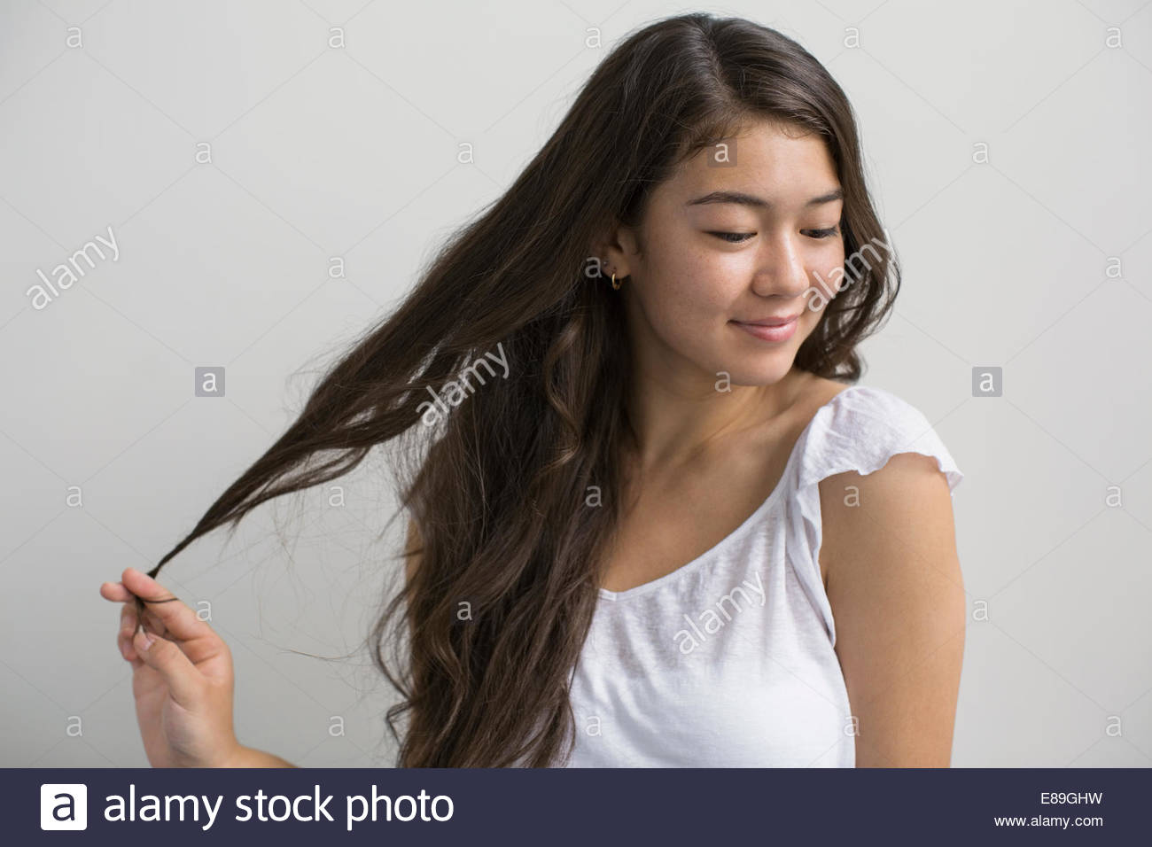 Twirling hair hi-res stock photography and images - Alamy