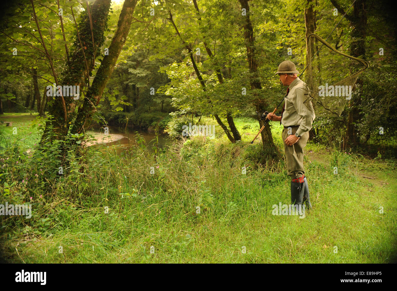 Fishing for trout salmon river camel Cornwall river bank Stock Photo ...