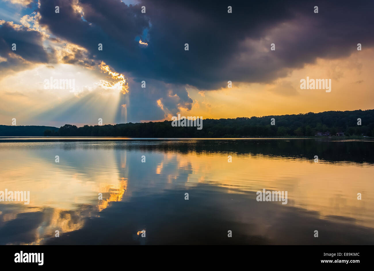 Sunset reflecting in Pinchot Lake, at Gifford Pinchot State Park ...