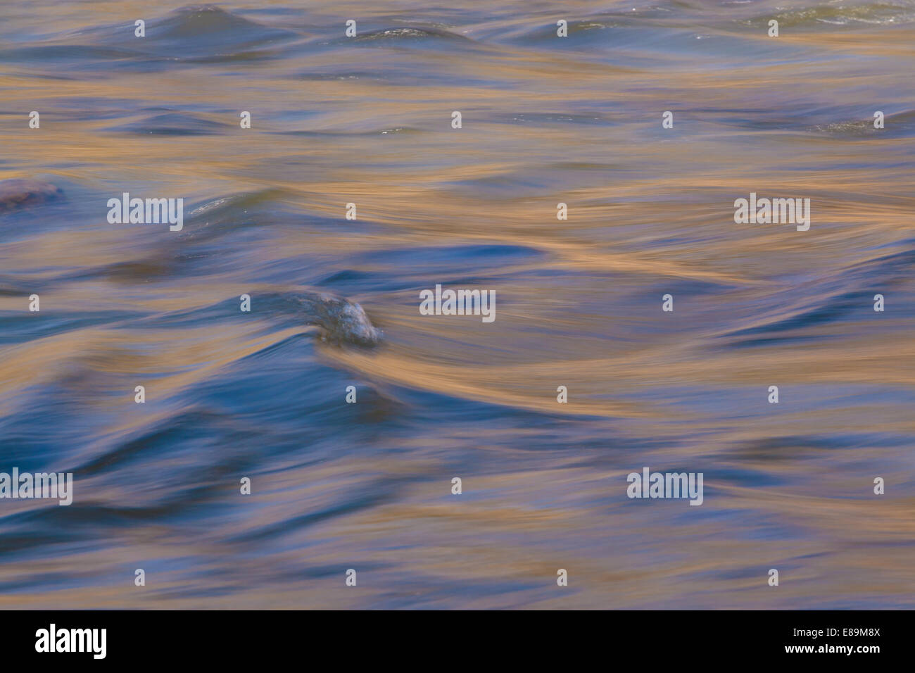 Sunlight Reflecting on Moving River Water Stock Photo - Alamy