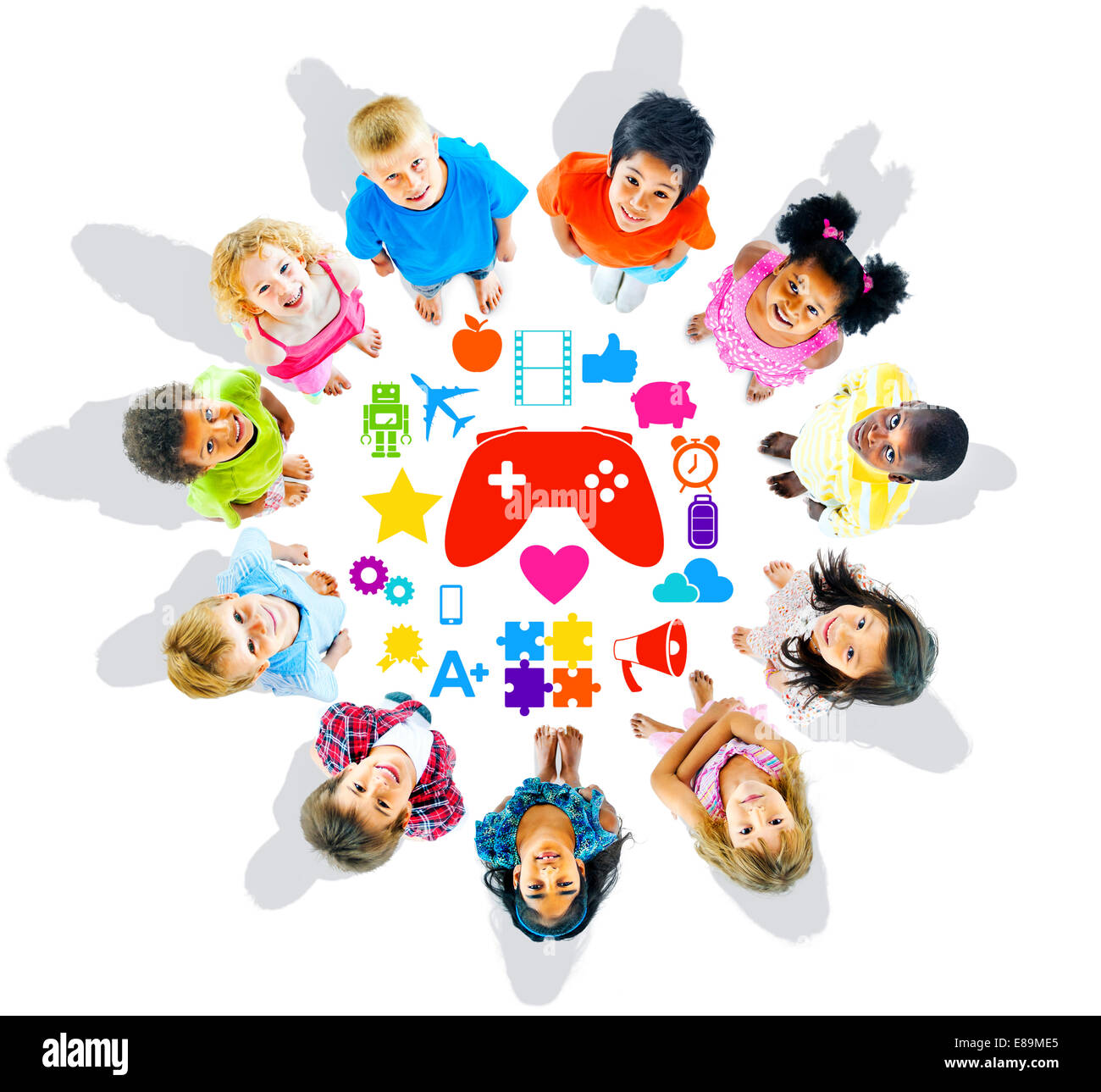 Group of Children Looking Up with Gaming Symbols Stock Photo - Alamy
