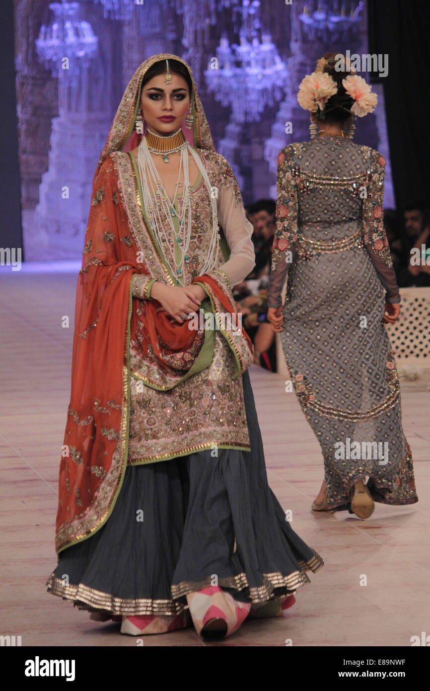 Lahore, Pakistan. 1st October, 2014. Models walk on a ramp to present ...