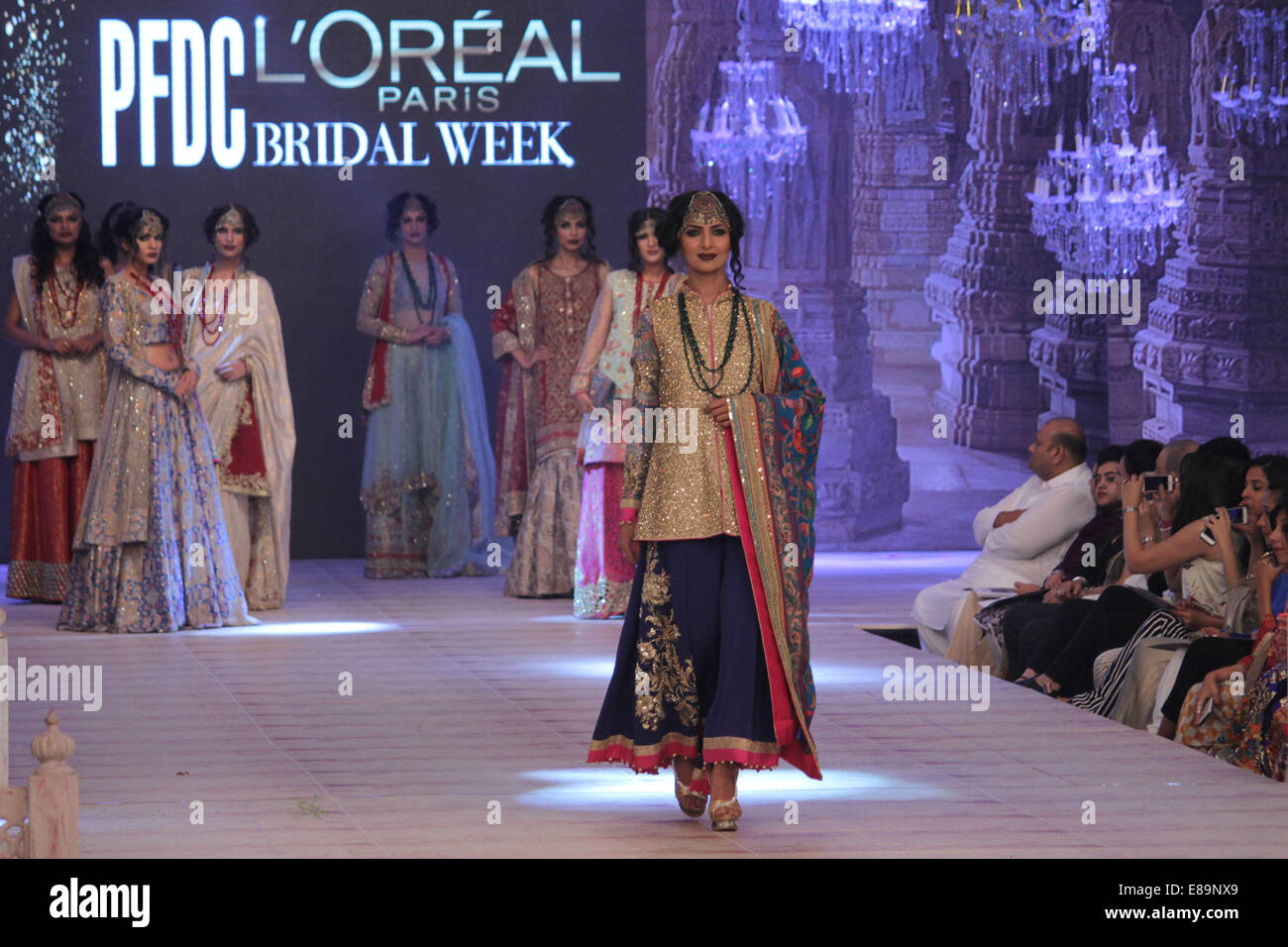 Lahore, Pakistan. 1st October, 2014. Models walk on a ramp to present ...