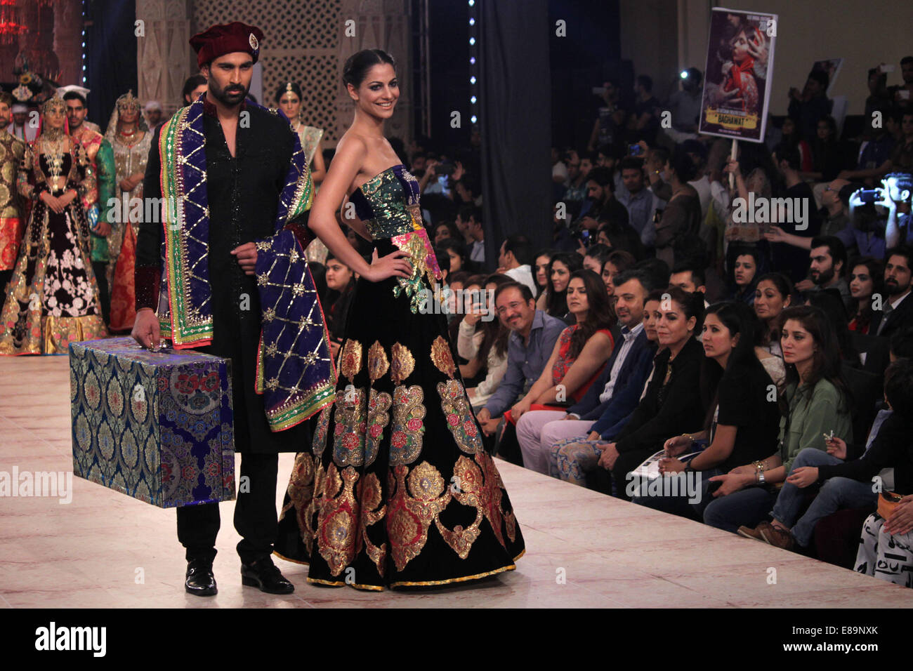 Lahore, Pakistan. 1st October, 2014. Models walk on a ramp to present ...