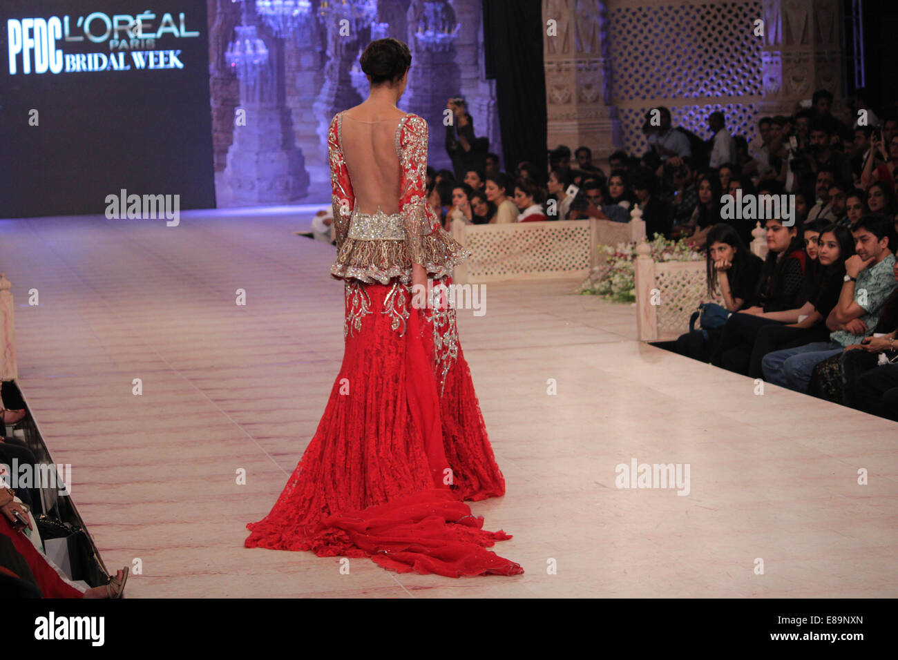 Lahore, Pakistan. 1st October, 2014. Models walk on a ramp to present ...