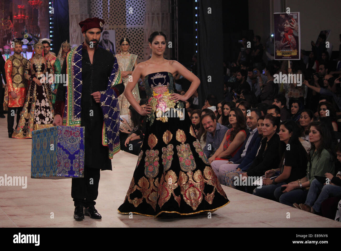Lahore, Pakistan. 1st October, 2014. Models walk on a ramp to present ...