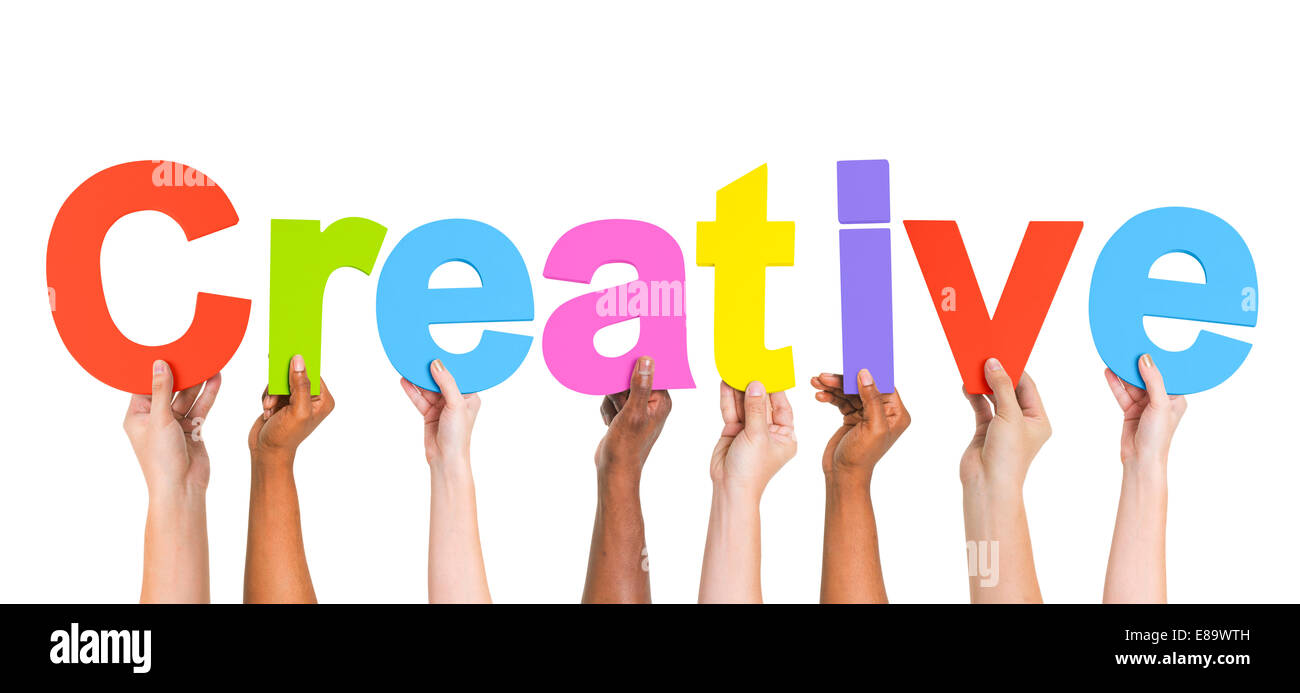 Diverse Hands Holding The Word Creative Stock Photo - Alamy