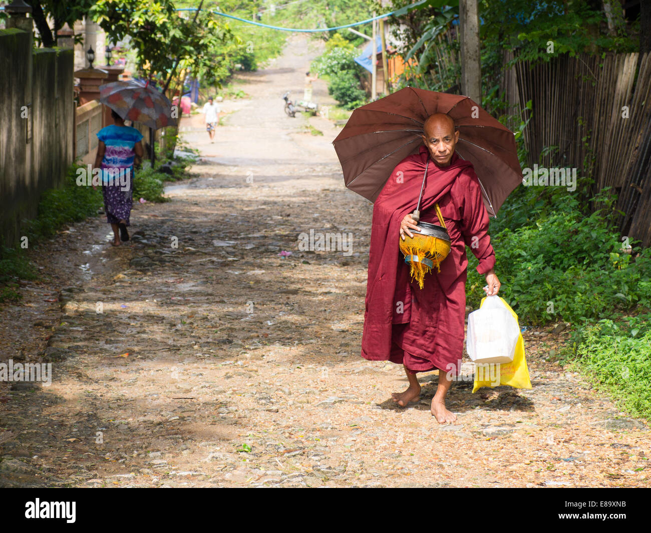 Man walking up the hill hi-res stock photography and images - Alamy