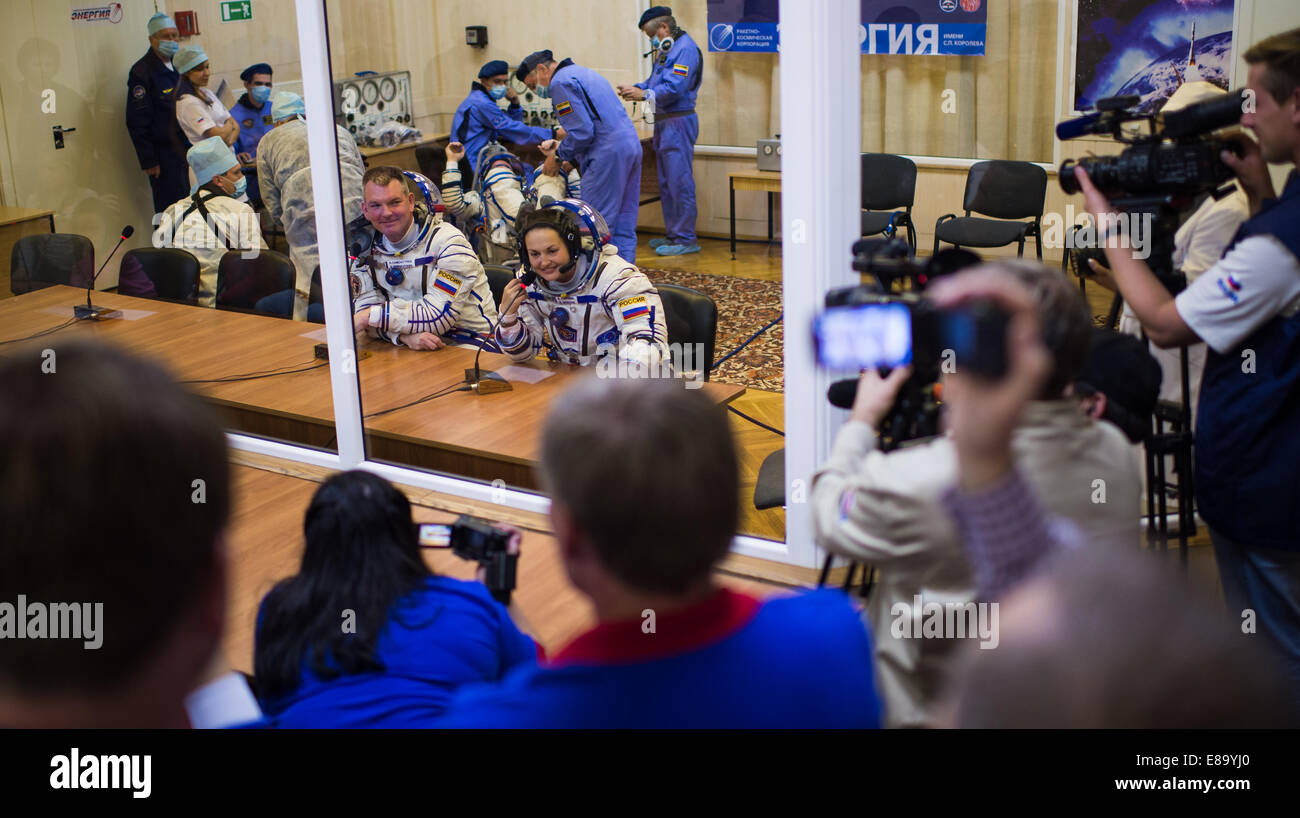 Expedition 41 crew members Elena Serova and Alexander Samokutyaev ...