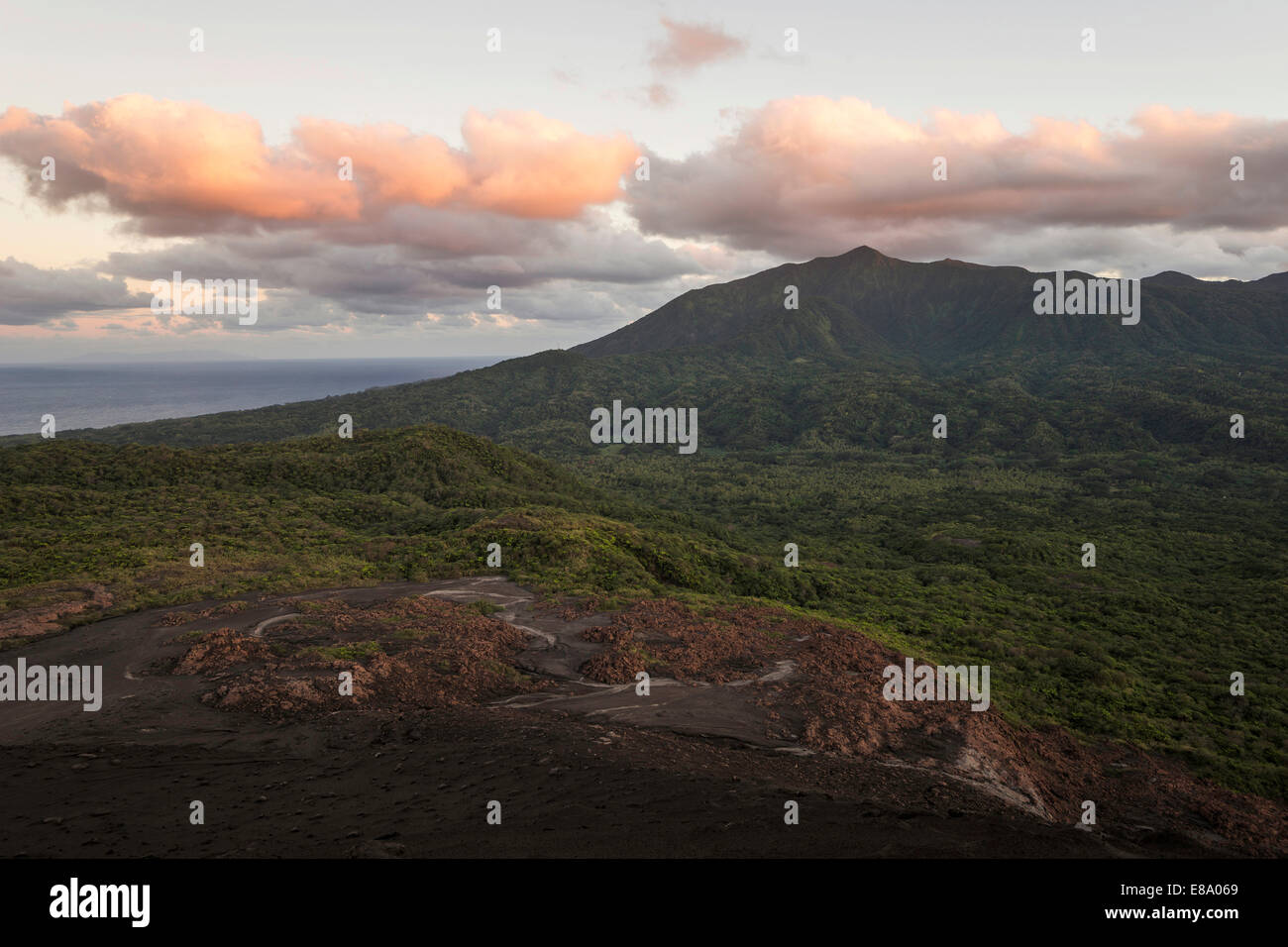 View from the crater of Mount Yasur volcano onto the sea in the morning ...