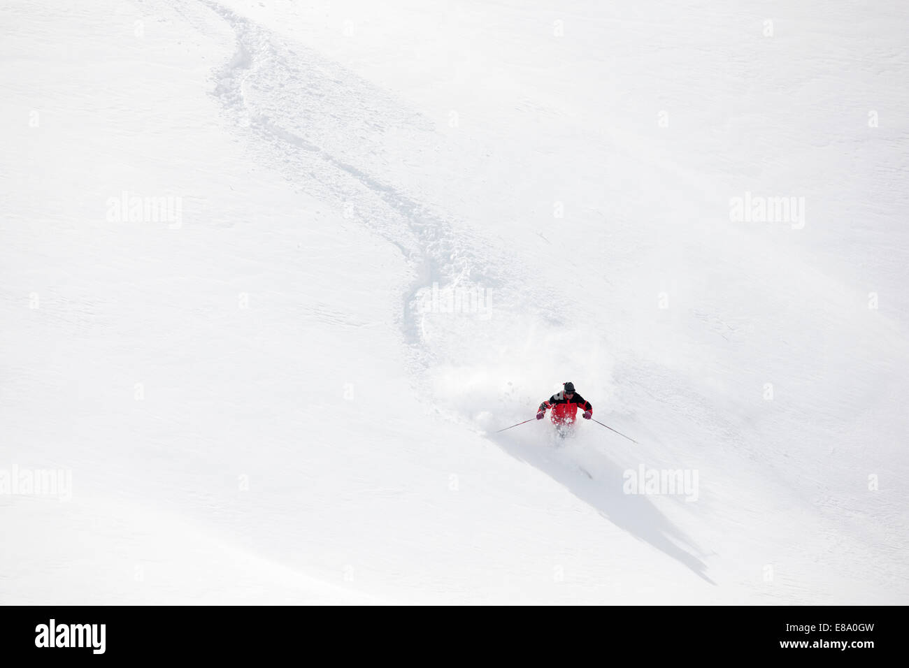 Skier skiing in deep snow, Hochfügen Mountain, Zillertal, Tyrol ...