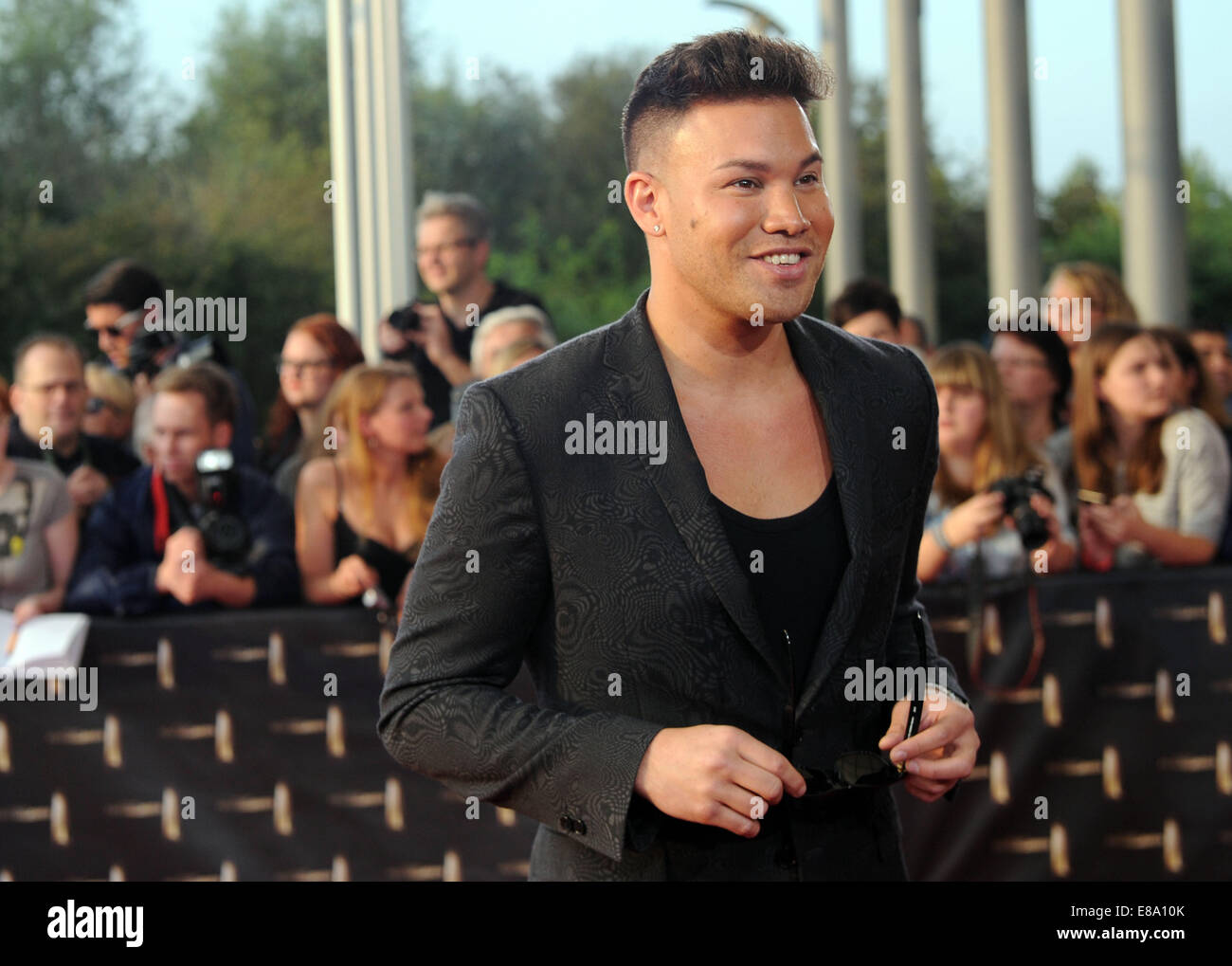Cologne, Germany. 2nd October, 2014. German rapper Kay One arrives for ...