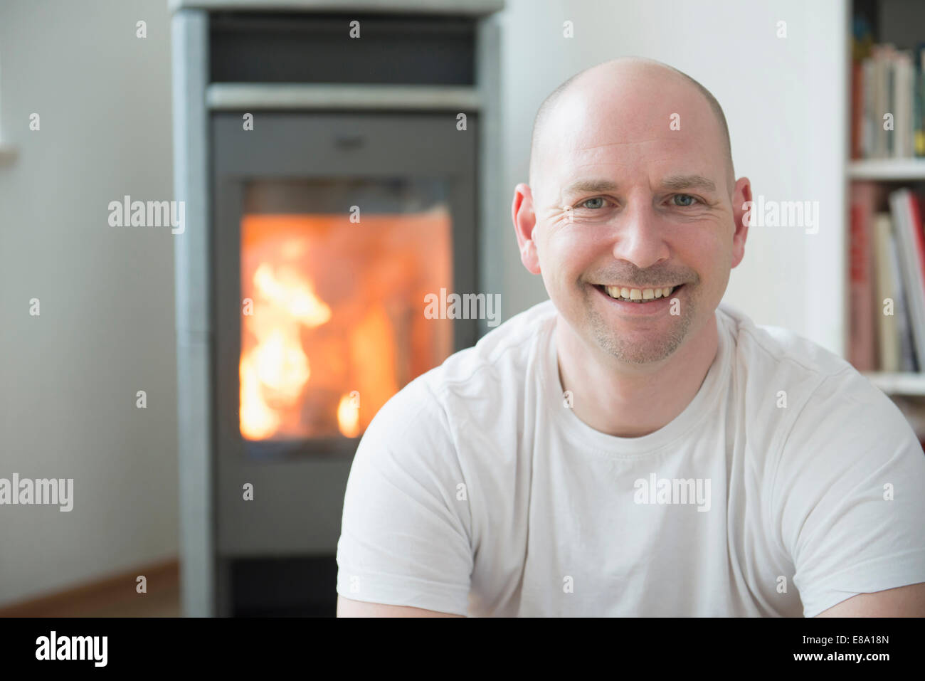 Man in living room with fireplace hi-res stock photography and images ...