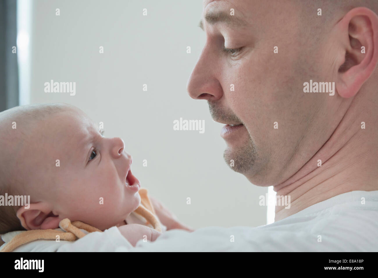 Father and baby boy communicate with each other, close up Stock Photo ...