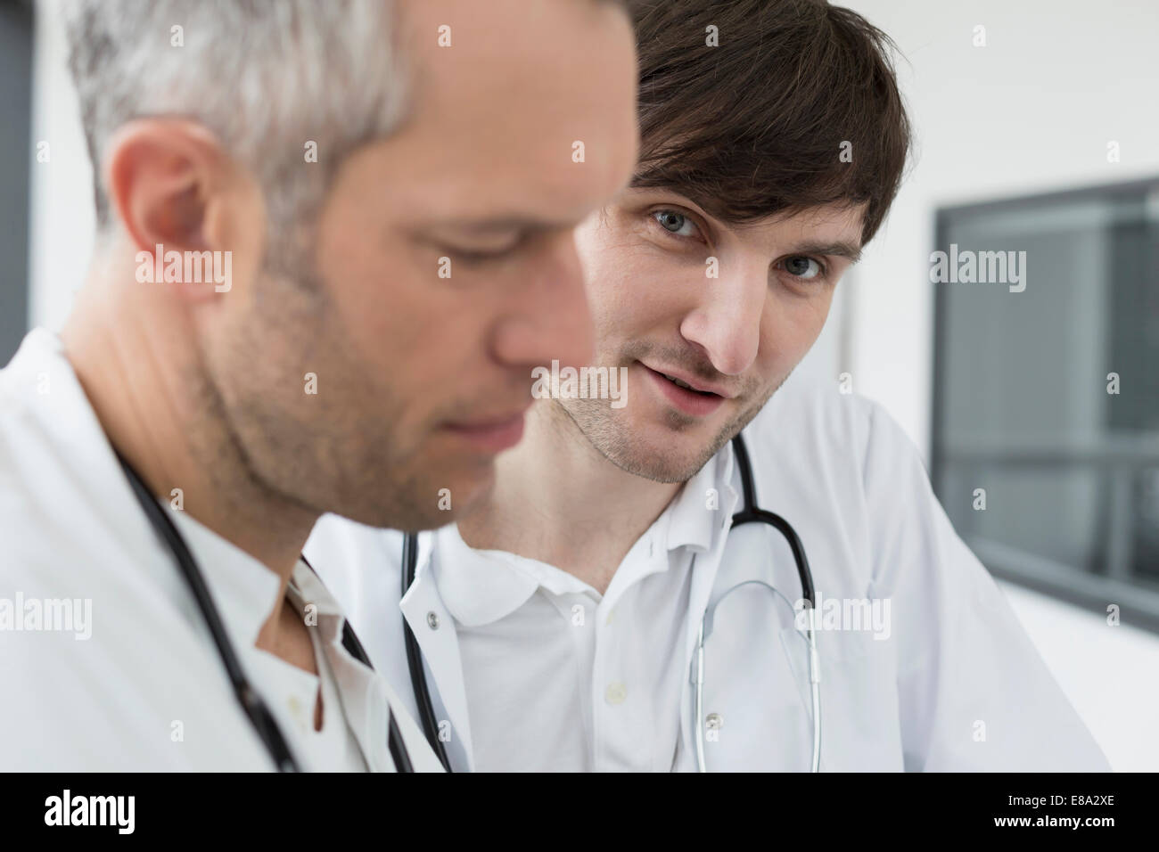 Doctors having conversation Stock Photo - Alamy