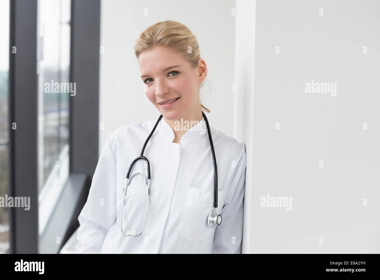 Female doctor smiling, portrait Stock Photo - Alamy