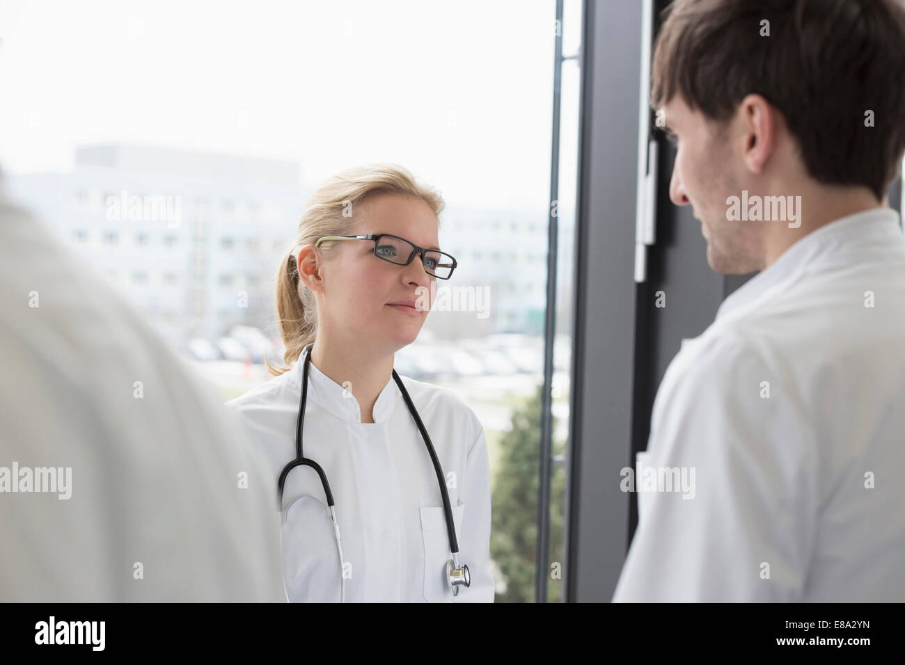 Doctors having conversation Stock Photo - Alamy
