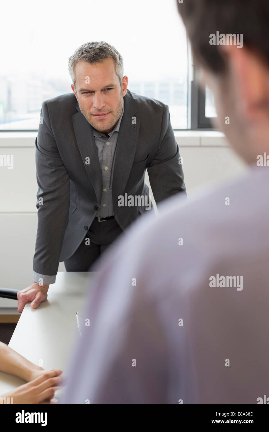 Young man interview smiling hi-res stock photography and images - Alamy