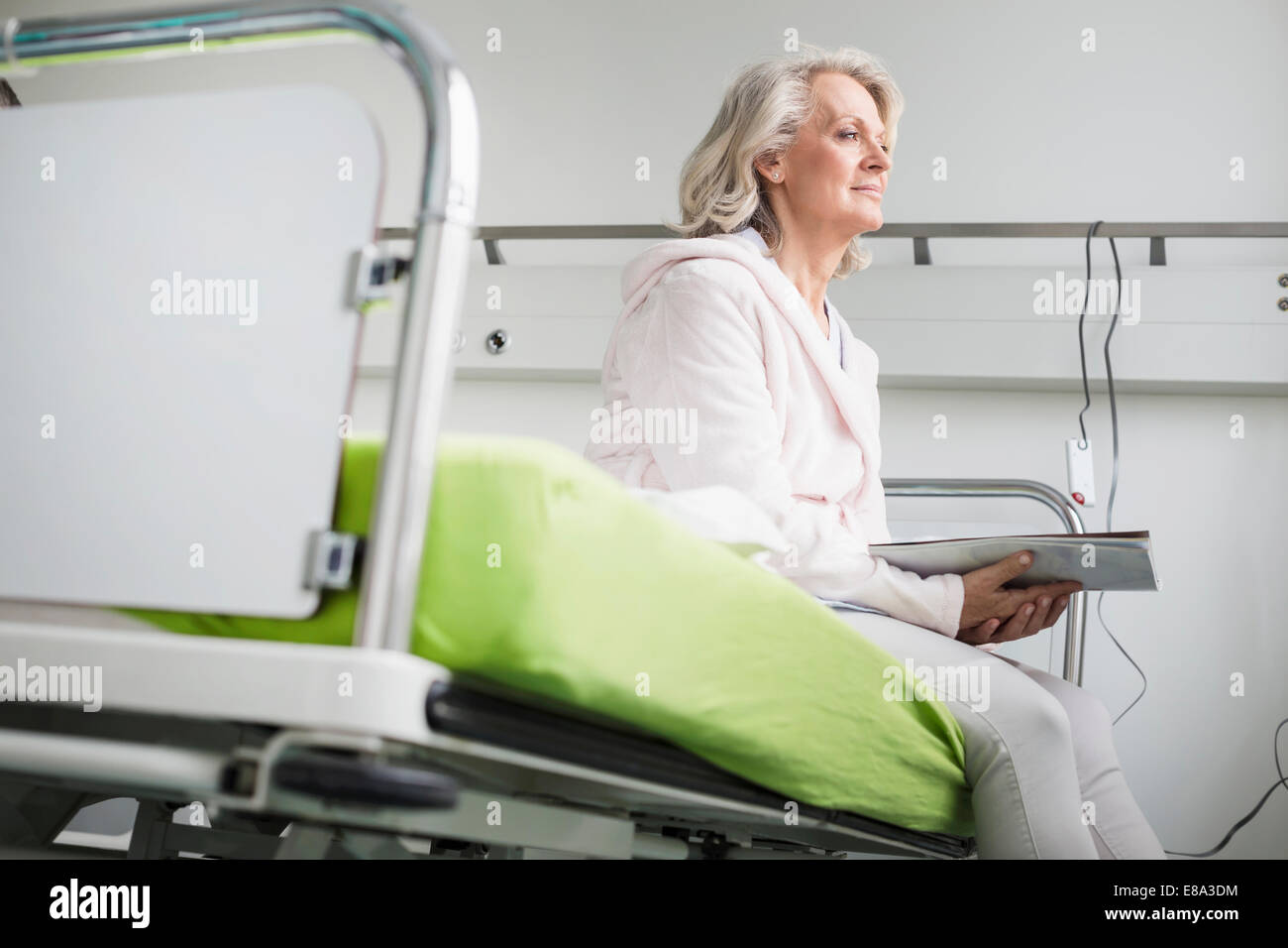 Sitting up in hospital bed hi-res stock photography and images - Alamy