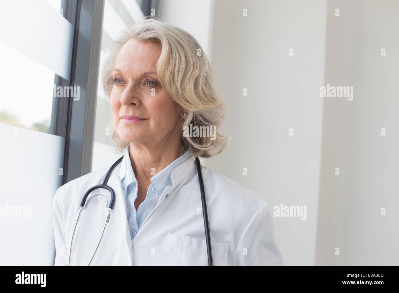 Portrait of senior doctor Stock Photo - Alamy