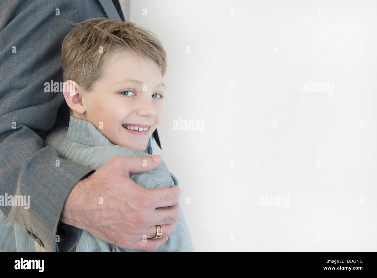 Father son suit care hi-res stock photography and images - Alamy