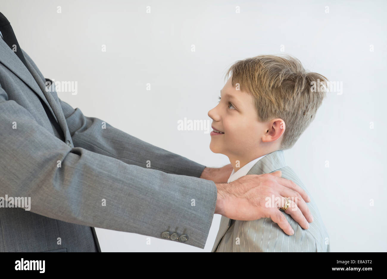 Father hand son shoulder hi-res stock photography and images - Alamy