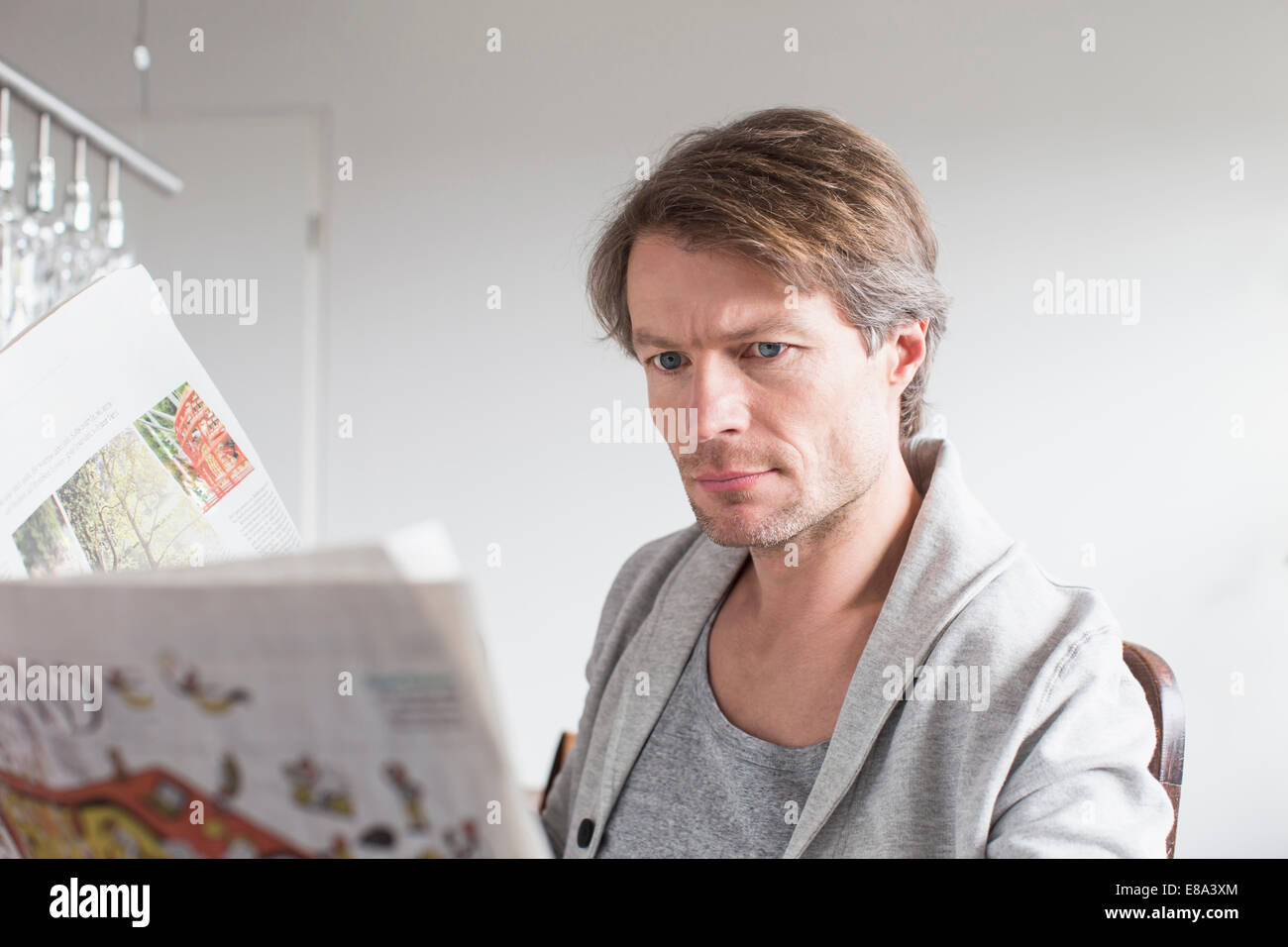 Shot man reading newspaper hi-res stock photography and images - Alamy