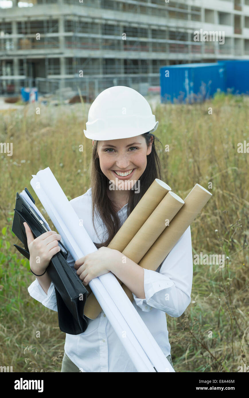 Construction holding building plans hi-res stock photography and images ...