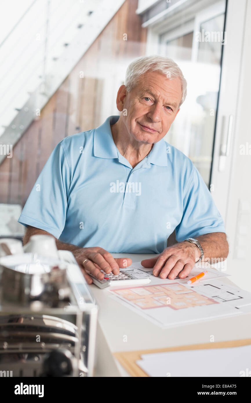 Man men male using calculator hi-res stock photography and images - Alamy