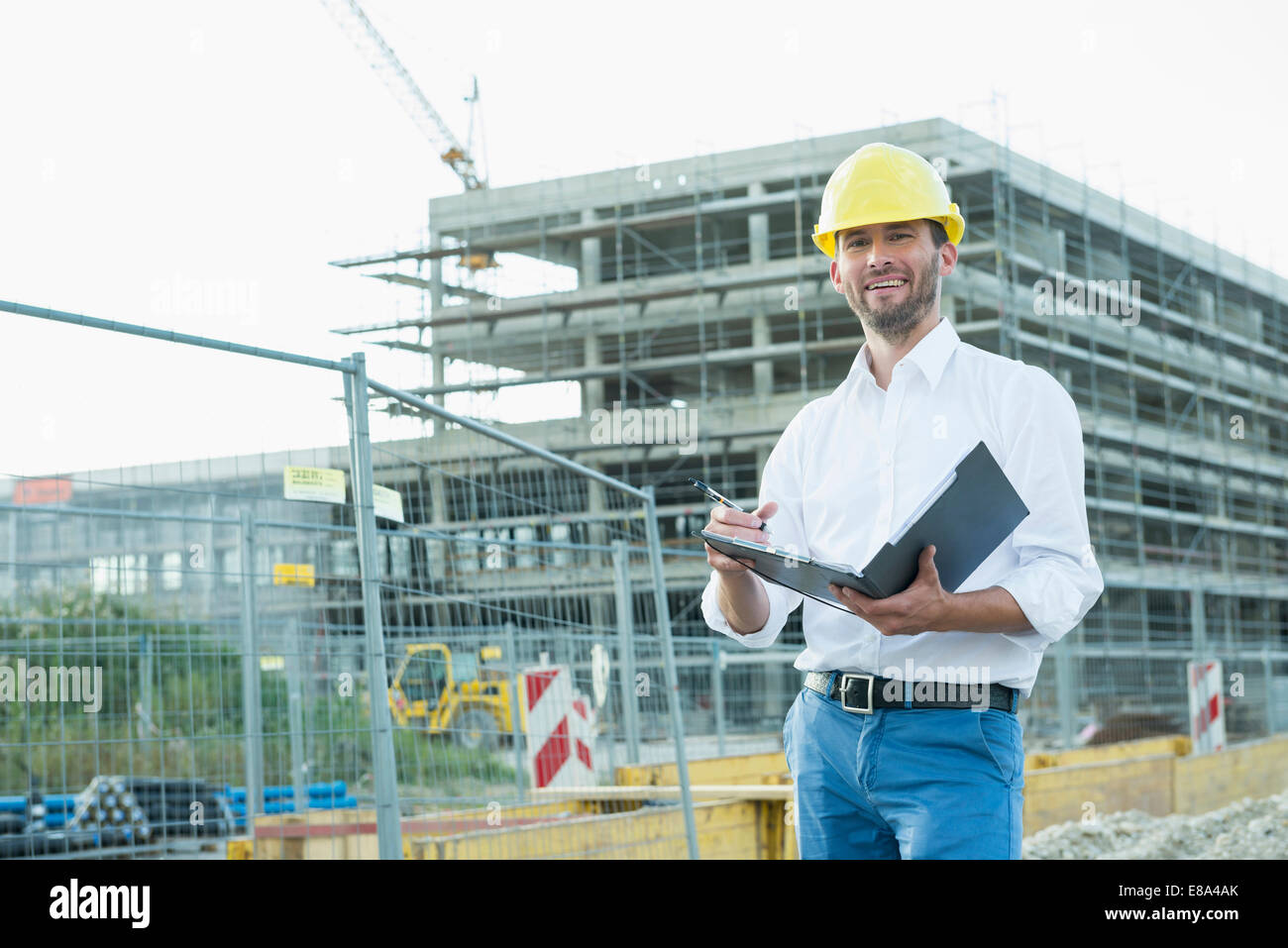 Architect on site Stock Photo - Alamy