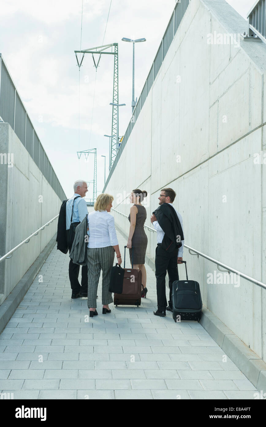 four colleagues on business travel Stock Photo - Alamy