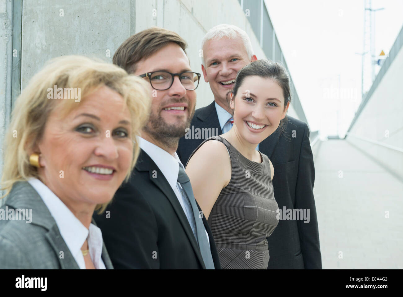group picture of four business partners Stock Photo - Alamy