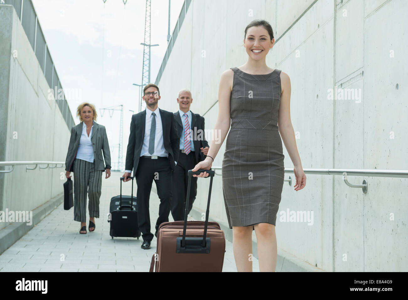 four colleagues on business travel Stock Photo - Alamy